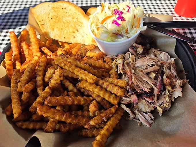 Crinkle-cut fries and fresh coleslaw prove even the sides deserve your full attention and appreciation.