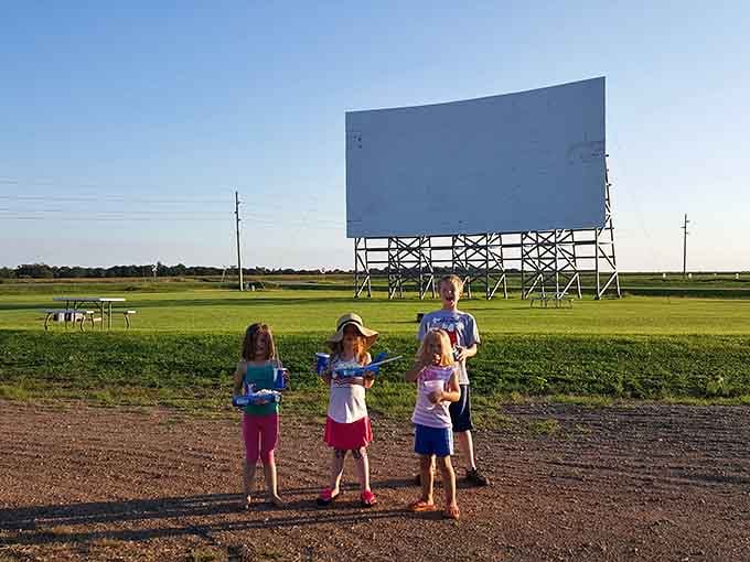 Kids enjoying the pre-show freedom to run around, something no indoor theater would ever tolerate or allow.