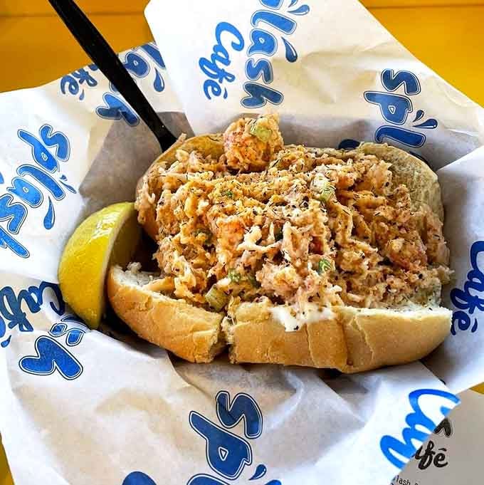 The lobster roll arrives like summer vacation on a bun, proving New England classics thrive on California's coast too.