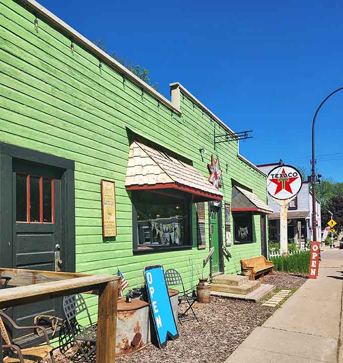 That vintage Texaco sign and apple-green exterior make this building impossible to miss, like a beacon for curious travelers.