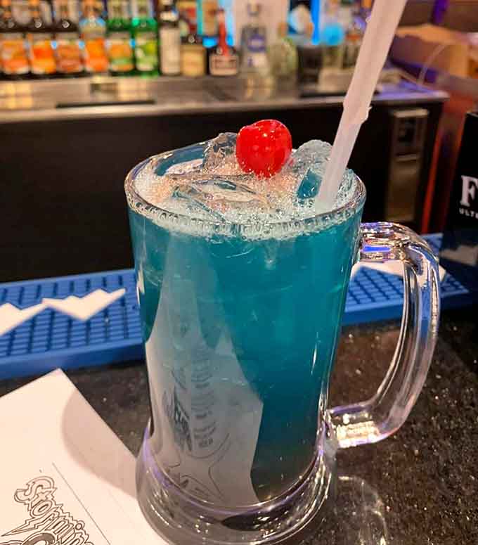 This electric blue cocktail looks like something a mermaid would order, complete with cherry on top for good measure.