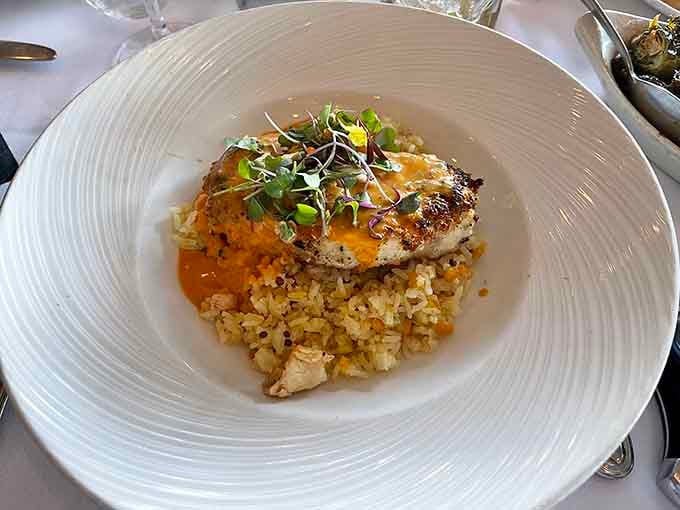 Sea bass so perfectly cooked it practically glows, proving fish can be fancy without being fussy about it.