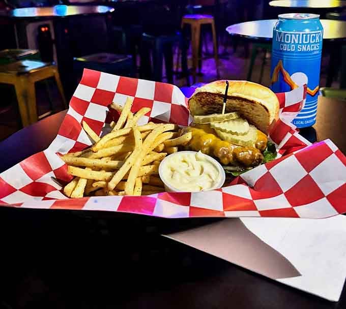 Burgers, fries, and pickles served in classic checkered baskets, because arcade food should look the part too.