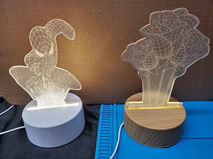 LED art lamps featuring Spider-Man and roses, proving home decor doesn't have to choose between whimsy and elegance.