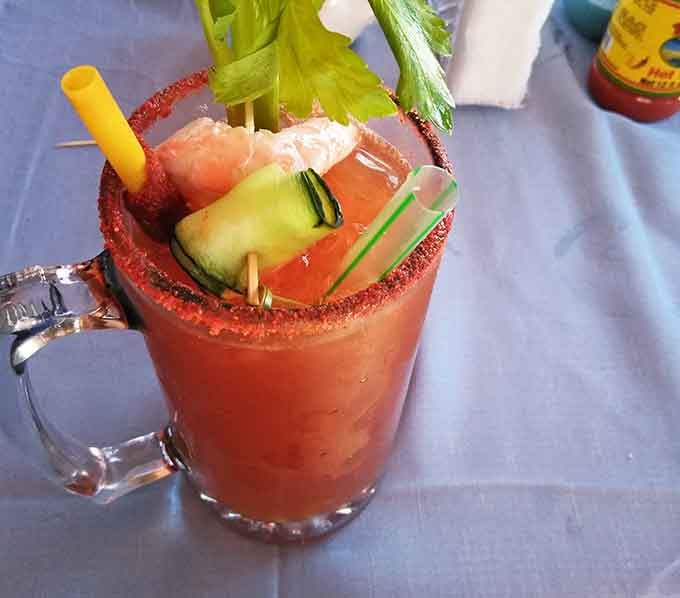 That Bloody Mary is dressed better than most people at brunch, complete with enough garnishes to qualify as lunch itself.