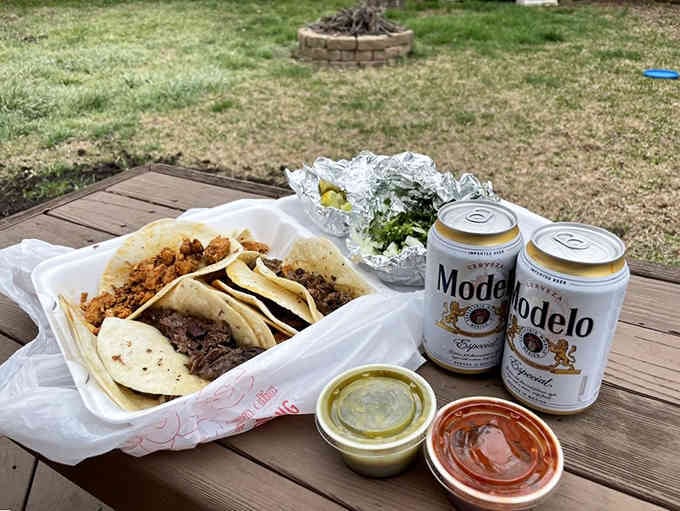 The perfect taco feast spread out under the Texas sky, complete with cold drinks and company.