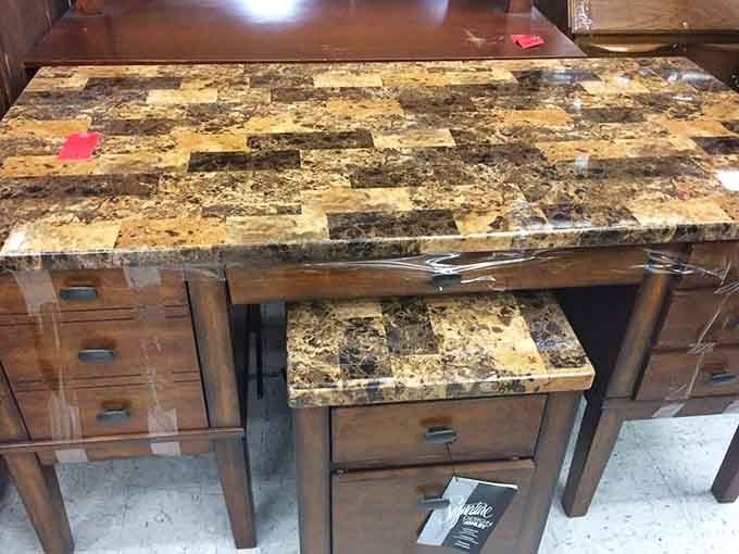 This marble-topped desk survived decades looking classier than most new furniture, proving quality outlasts trends every time.
