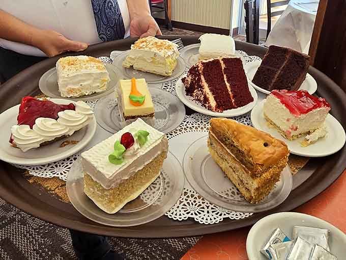 A dessert tray that rivals any bakery window, making your "just coffee" plan completely impossible to maintain.