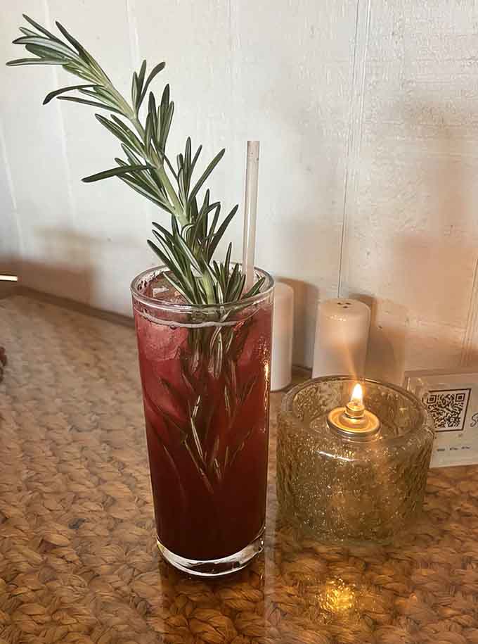 That rosemary sprig isn't just garnish, it's the restaurant's way of making your cocktail Instagram-worthy and delicious.
