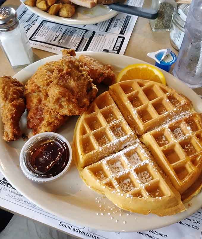 Chicken and waffles dusted with powdered sugar is the sweet-savory combination your taste buds have been craving.