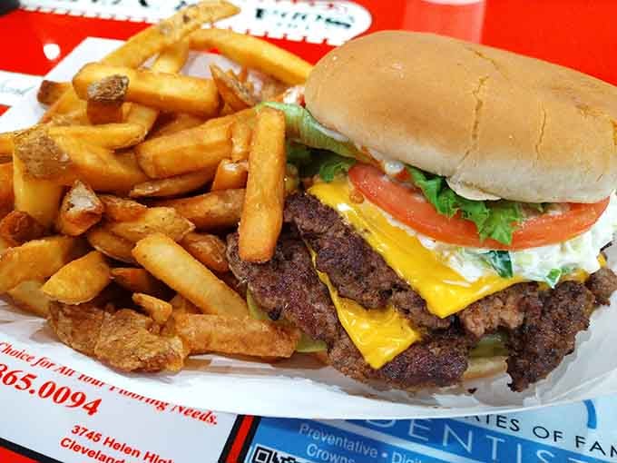 A cheeseburger and fries combo that would make any drive-in movie night jealous of your lunch.