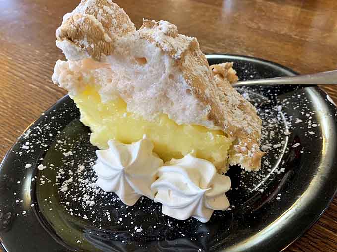 Lemon meringue pie with sky-high peaks of toasted meringue, because homemade desserts are serious business at this cafe.