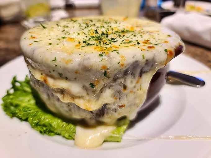 French onion soup with that gloriously melted cheese blanket, comfort in a crock that never goes out of style.