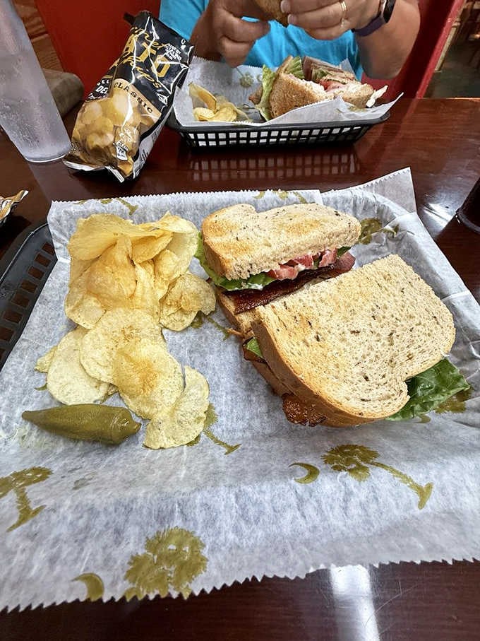 A classic BLT with chips and a pickle spear proves that sometimes the old standards are standard for good reason.