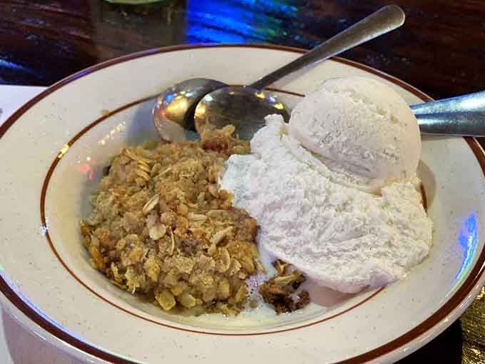 Strawberry rhubarb crisp topped with ice cream, because sometimes dessert needs to be a production number.