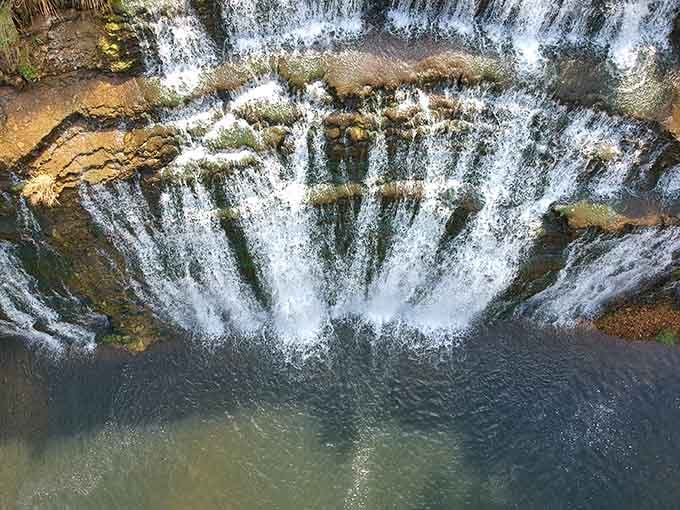 From above, the falls create their own natural amphitheater where water performs daily shows for lucky spectators below.