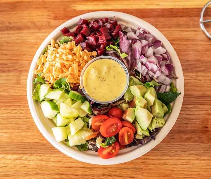 A rainbow of fresh ingredients arranged so beautifully, you almost feel guilty eating it &ndash; almost, not quite.