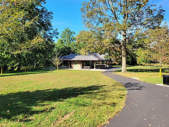 Cadwalader Park's open pavilion sits ready for picnics, proving Frederick Law Olmsted knew what he was doing.