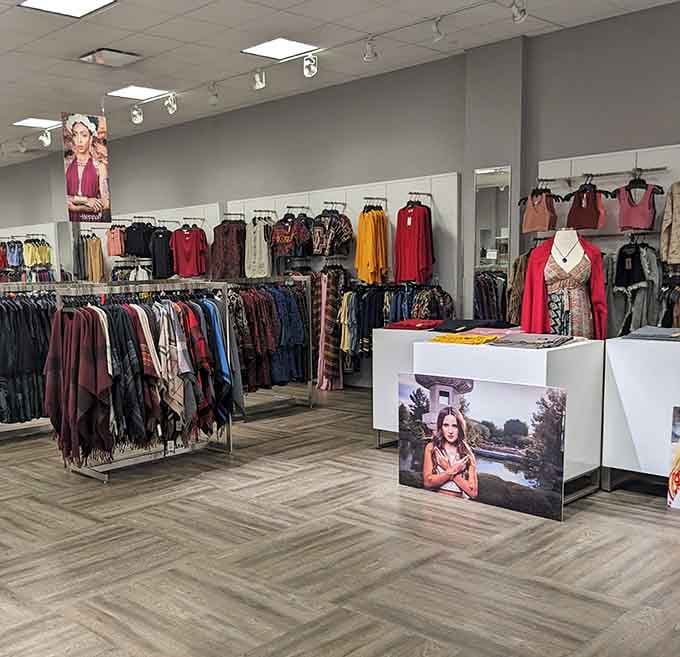 Racks of women's clothing stretching endlessly, each piece a potential wardrobe transformation waiting to happen patiently.