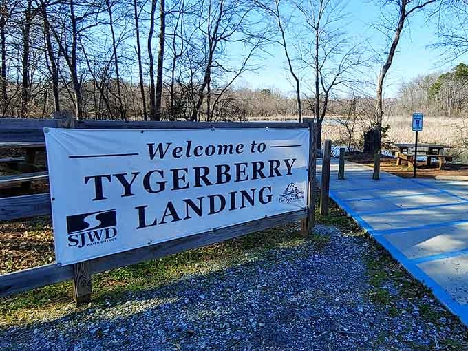 The welcome sign promises exactly what it delivers: simple access to nature's best fishing spot.