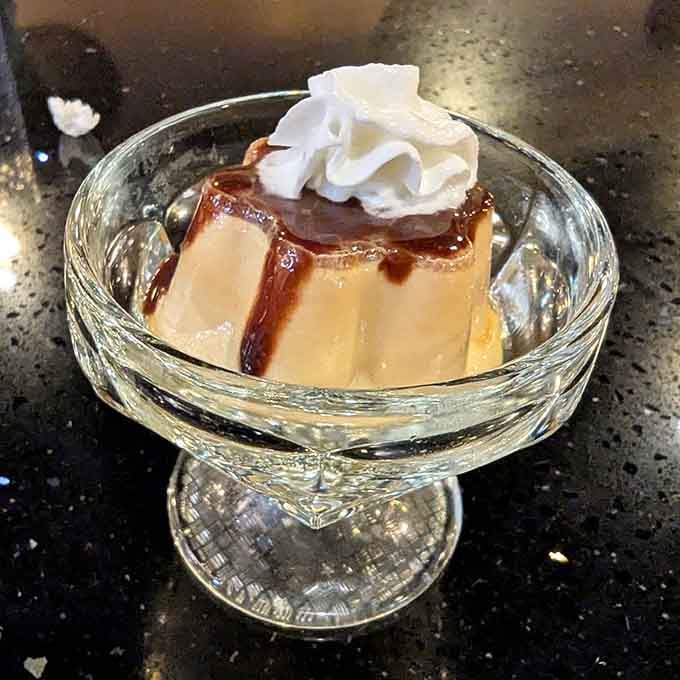 Classic flan topped with whipped cream and caramel is the sweet ending your dinner date has been waiting for.