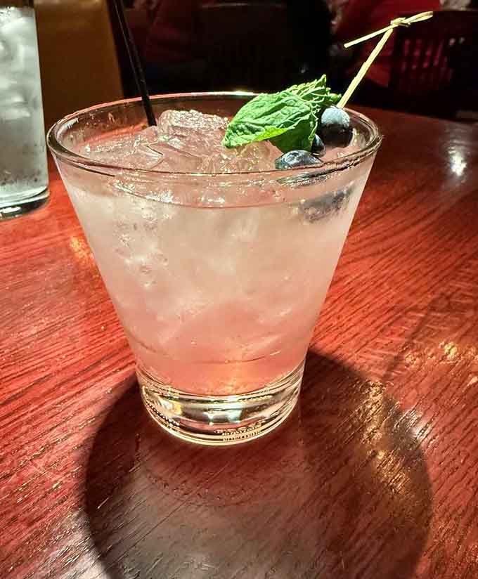 A mojito so refreshing it practically whispers "you've earned this" with every minty, bubbly sip.