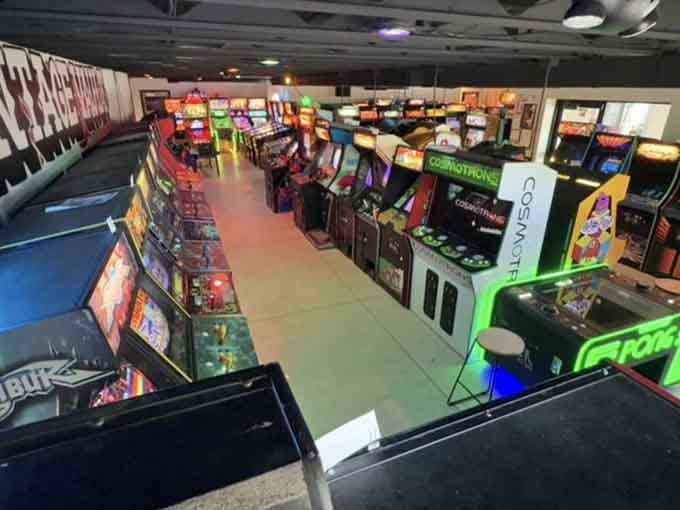 The overhead view reveals a treasure trove of gaming history, each machine representing a different chapter in arcade evolution and fun.