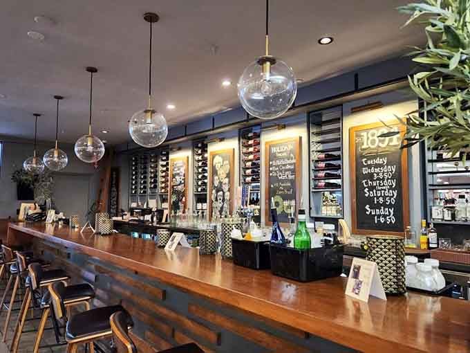 A sophisticated wine bar area adds grown-up refreshment to your literary expedition through the stacks.