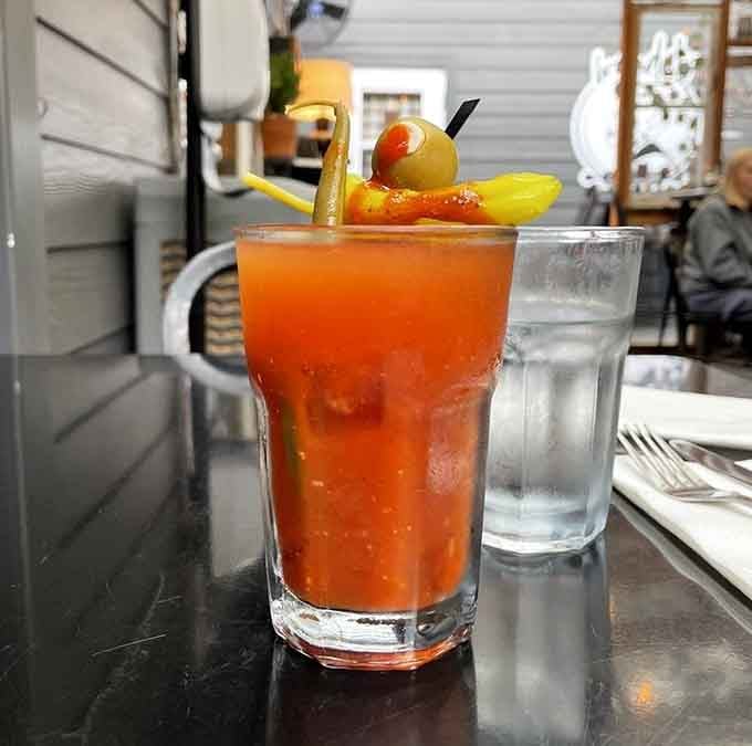 That Bloody Mary means business, garnished like it's ready to solve all your problems before noon arrives.
