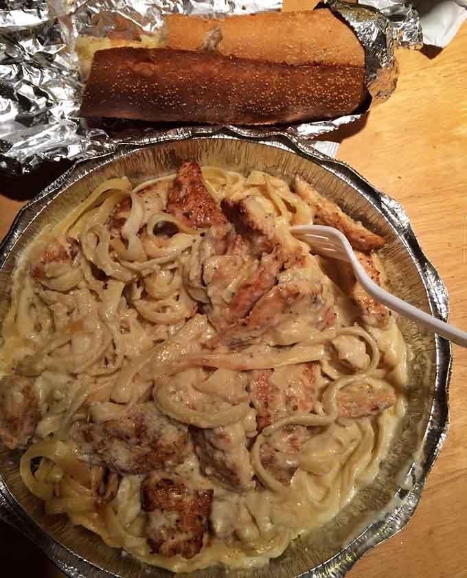 Creamy alfredo sauce coating tender chicken and pasta, comfort food that tastes like someone's nonna made it with love.