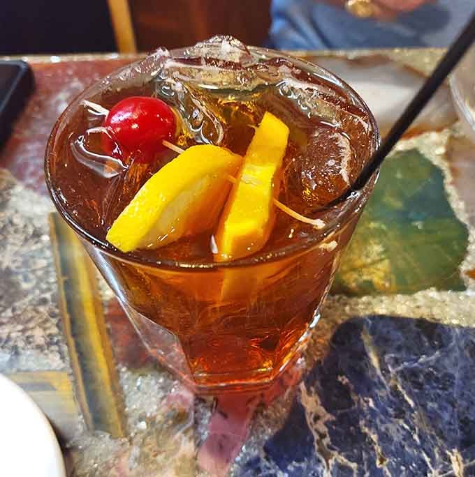 A proper brandy Old Fashioned with fruit garnish that would make any Wisconsinite nod in solemn approval here.