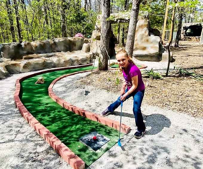Mini golf among the trees turns a simple game into an outdoor adventure the whole family enjoys.
