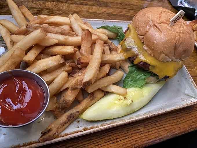 A proper cheeseburger with a mountain of fries is the kind of meal that makes everything else seem less important.