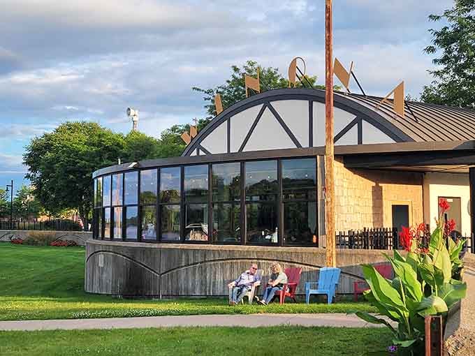 The Boat House sits riverside where modern design meets waterfront dining in perfect Minnesota harmony.
