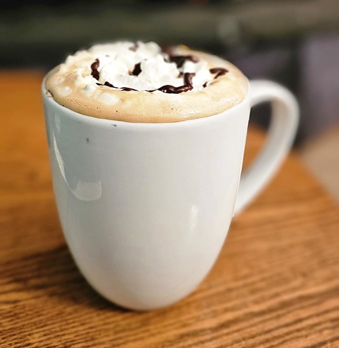 Topped with whipped cream and chocolate drizzle, this mocha is basically a hug in a mug for cold mornings.