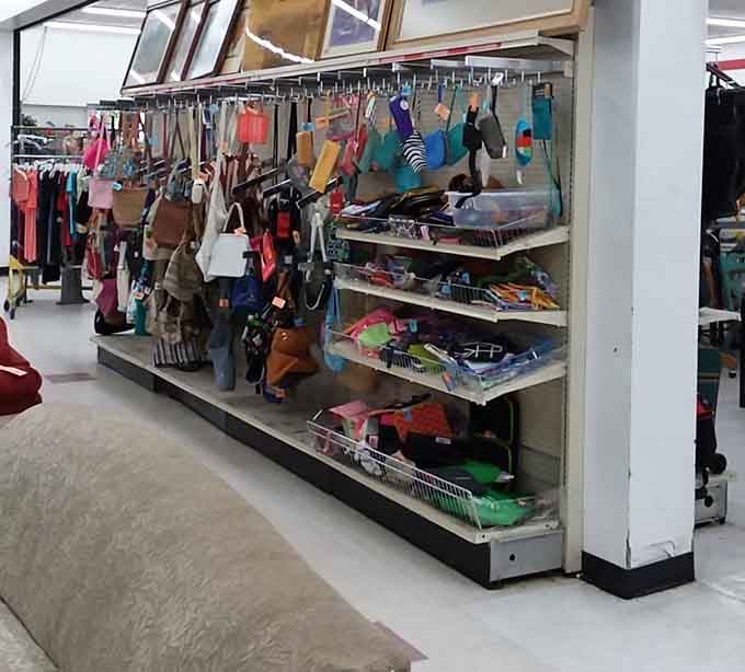 Handbags hanging like an accessories department, from everyday totes to statement pieces with stories to tell.