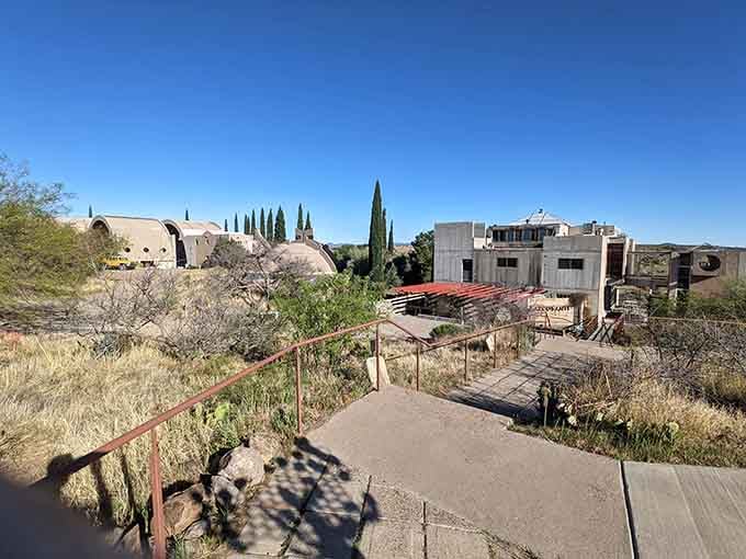 Concrete domes and geometric forms rise from the mesa like a architect's fever dream made wonderfully real.
