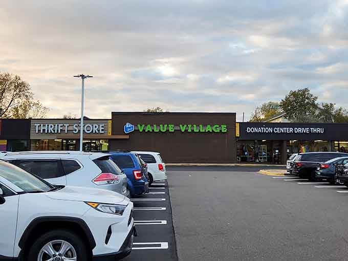 Evening light bathes this Value Village location where the full parking lot proves bargain hunting never goes out of style.