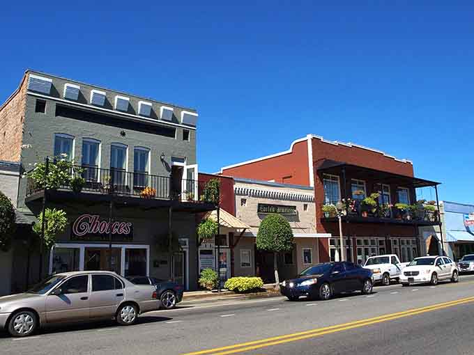 Balconies and storefronts create layers of architectural interest that reward those who actually look up while walking.