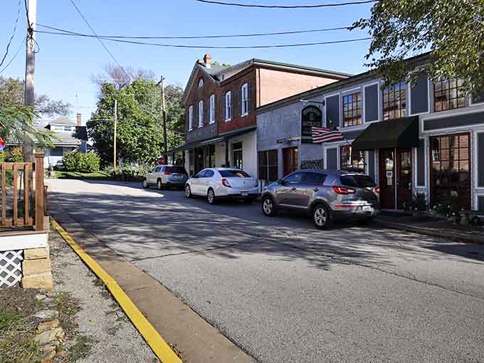 Historic buildings in warm earth tones create a streetscape that feels like stepping into a Mayberry episode, minus the black-and-white.
