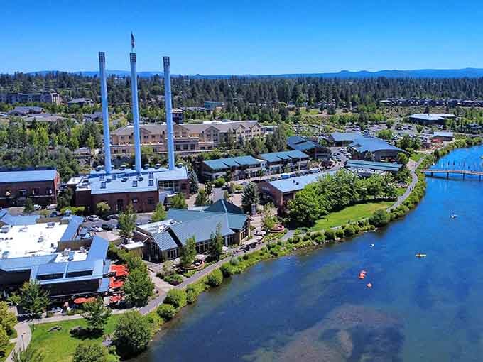 The Deschutes River curves through Bend's Old Mill District, blending outdoor adventure with urban energy perfectly.