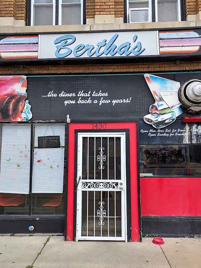 The ornate security door adds character to a facade that's pure Americana, chrome accents and all.