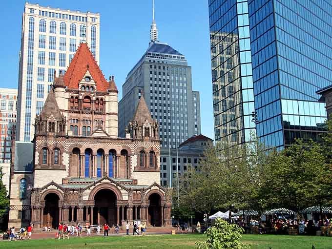 Historic Trinity Church holds its ground against modern skyscrapers, proving old-school elegance never goes out of style completely.
