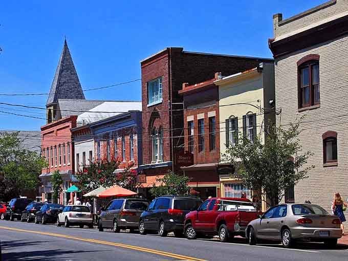 Chestertown's sunny street scene showcases parked cars alongside buildings that remember when horses filled these same spots.