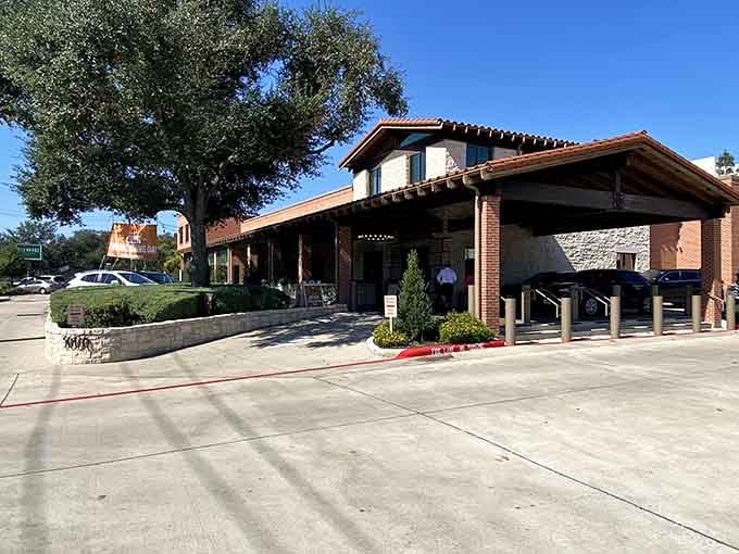 Classic brick and stucco architecture whispers of countless family dinners served with a smile and generous portions.