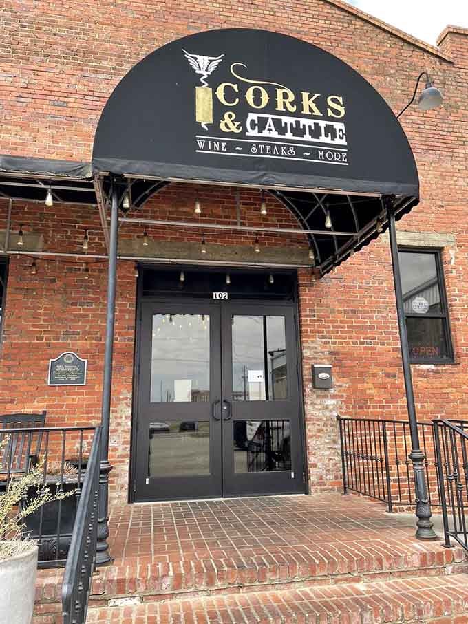 The classic brick facade and curved awning announce a downtown steakhouse that respects tradition while embracing quality.