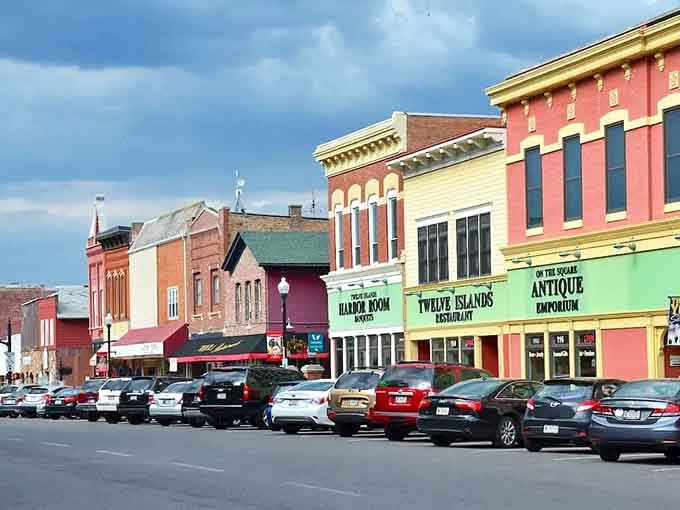 Colorful storefronts pop like a box of crayons, proving that small-town charm doesn't have to mean boring beige buildings.