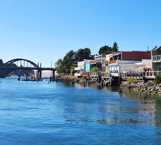 Florence's Siuslaw River reflects the sky like polished glass, houses lining up for the best view.