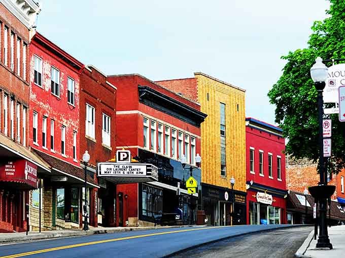 Frostburg's bold red and yellow buildings refuse to blend in, celebrating individuality like a box of crayons came to life.