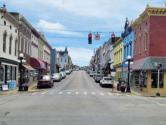 Pastel buildings stand shoulder to shoulder like a lineup of Easter eggs, cheerful and impossible not to smile at.